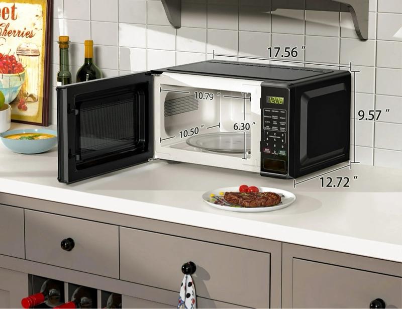 Mainstays 0.7 Cu ft Countertop Microwave Oven 700 Watts Black with LED ...